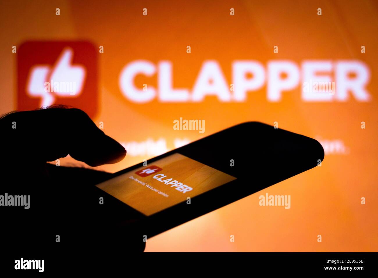 In this photo illustration the Clapper logo seen displayed on a ...