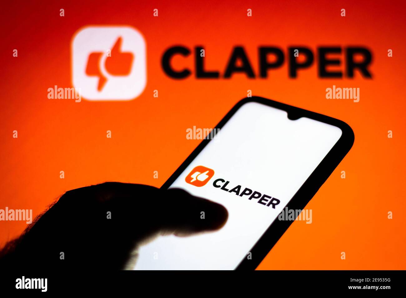 In this photo illustration the Clapper logo seen displayed on a ...