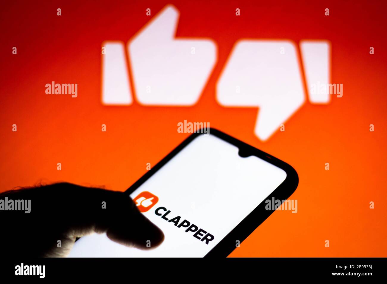 In this photo illustration the Clapper logo seen displayed on a ...