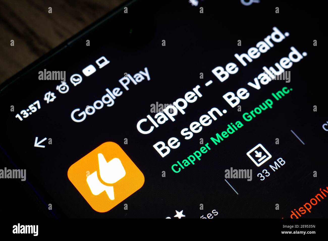 In this photo illustration the Clapper logo seen displayed on a ...