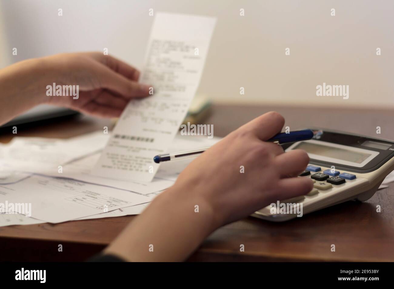 Woman examine finances hi-res stock photography and images - Alamy