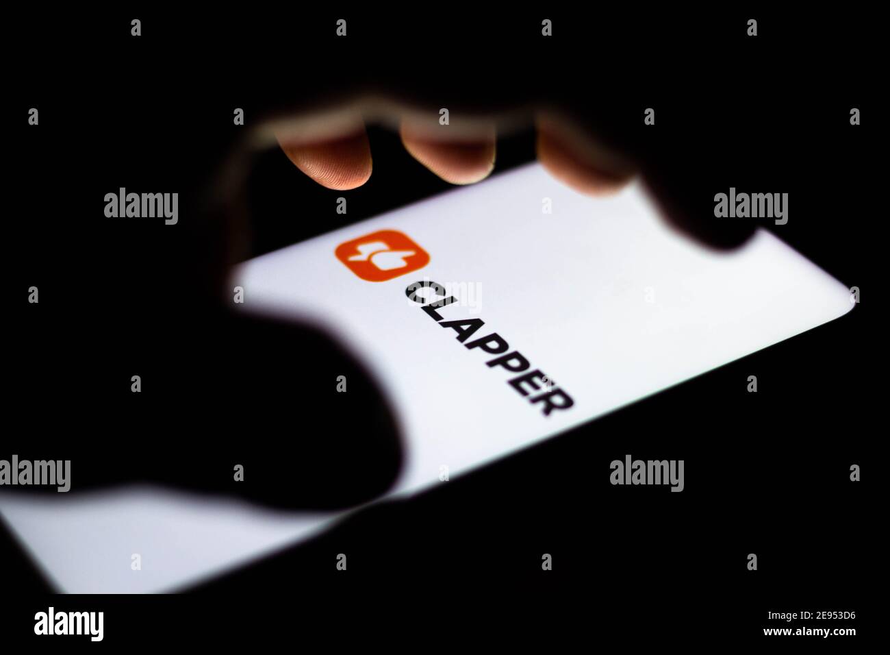 In this photo illustration the Clapper logo seen displayed on a ...