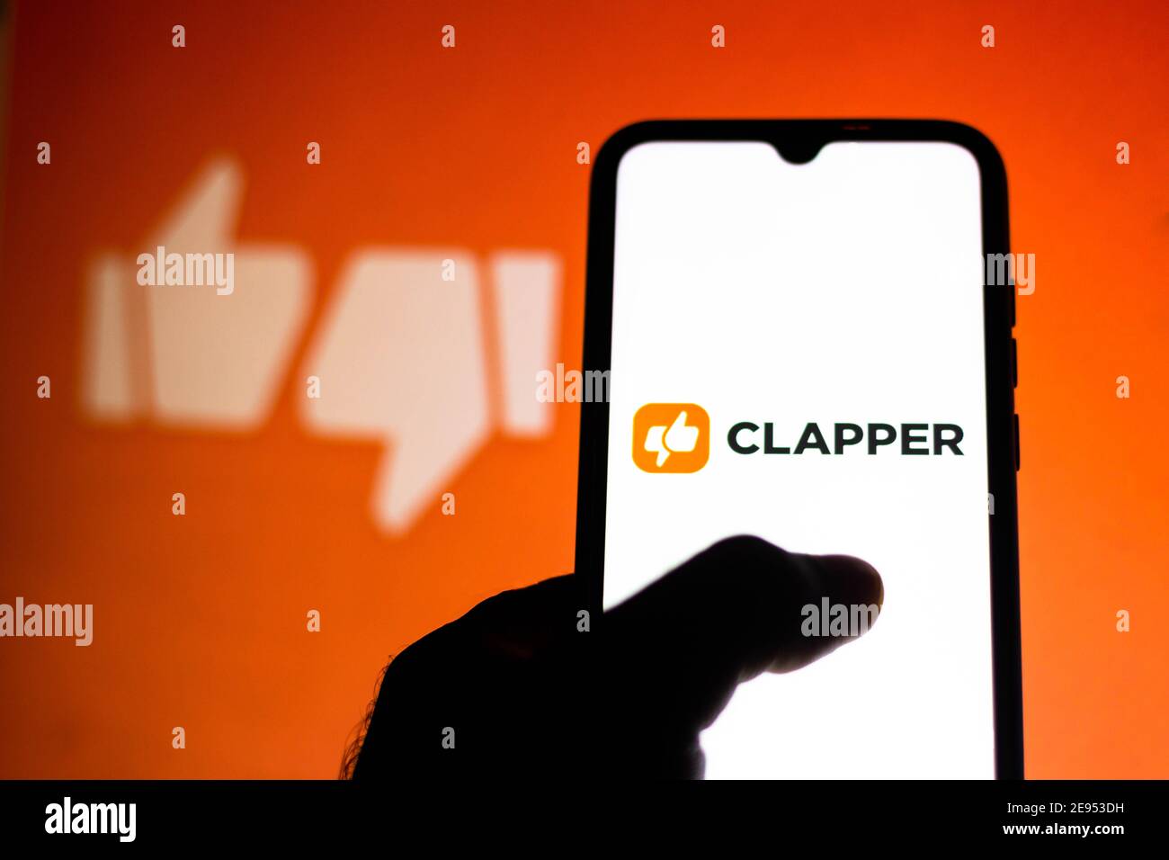 In this photo illustration the Clapper logo seen displayed on a ...