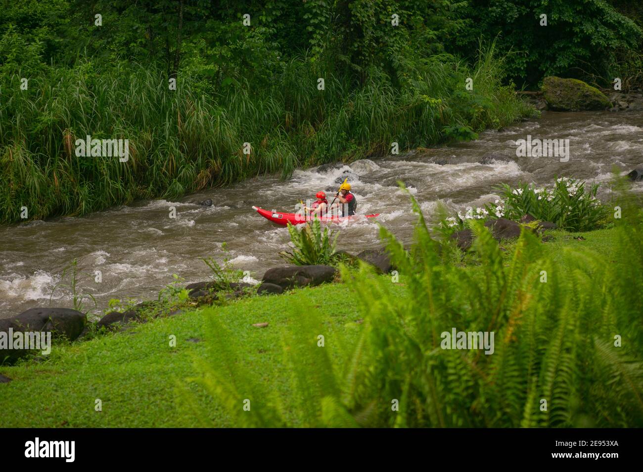 Two guys kayaking in La Fortuna of Costa Rica, Central America Stock ...