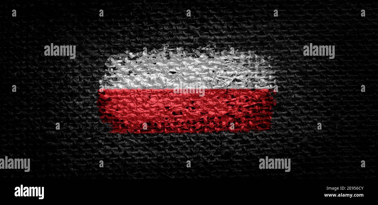 National flag of the Poland on dark fabric Stock Photo - Alamy