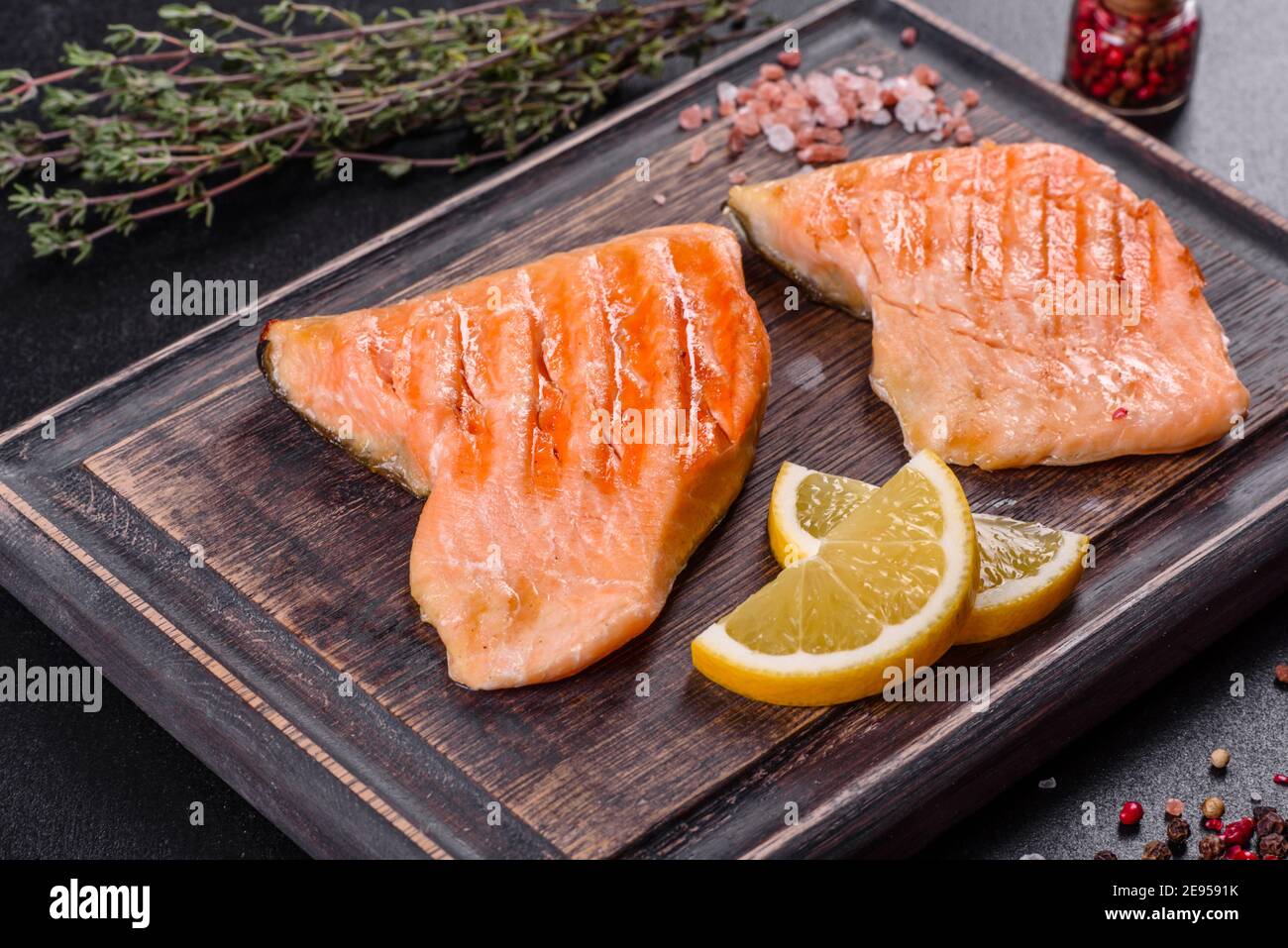 Tasty fresh red fish arctic char baked on a grill. Source of omega ...