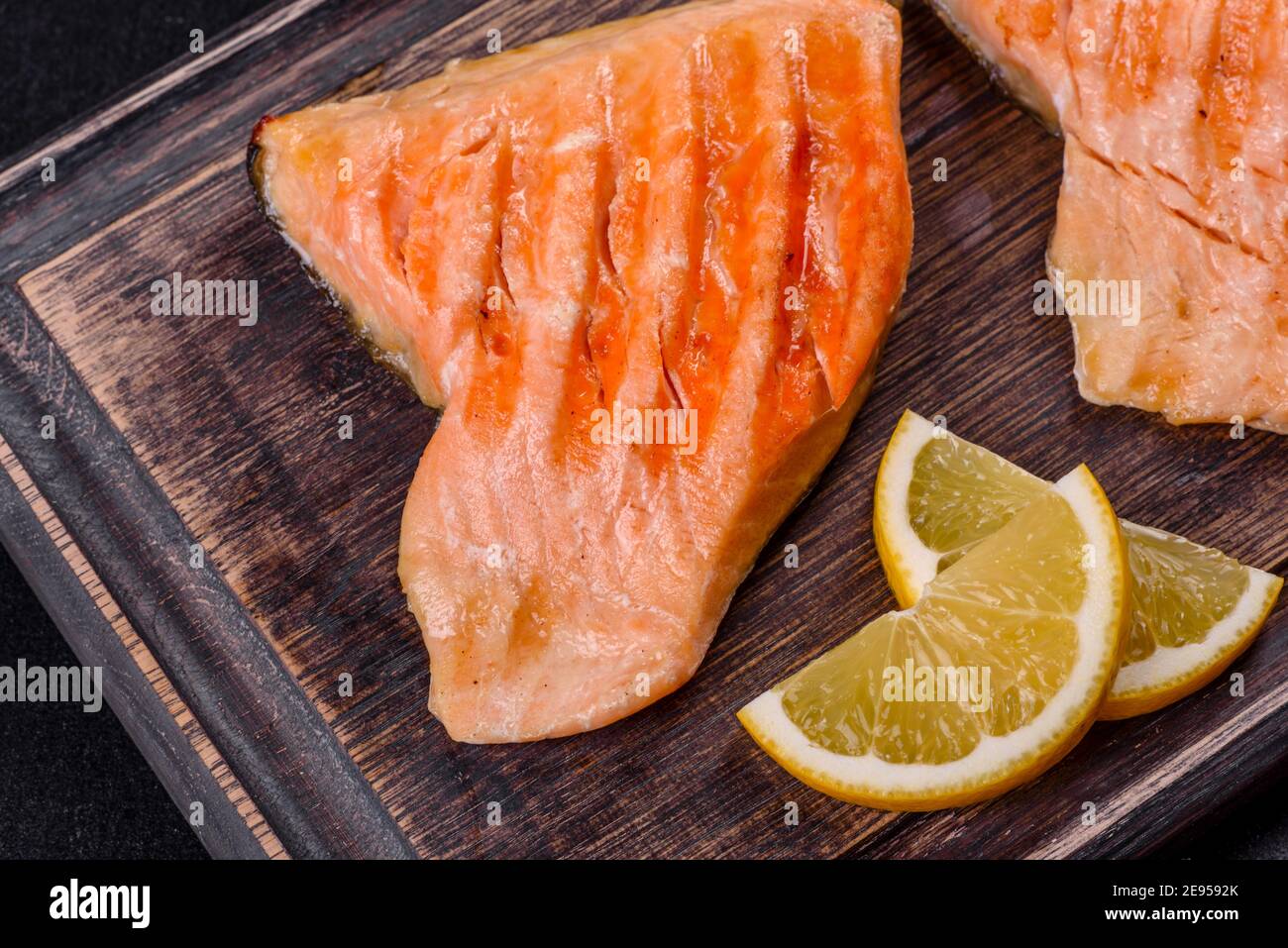 Tasty fresh red fish arctic char baked on a grill. Source of omega ...