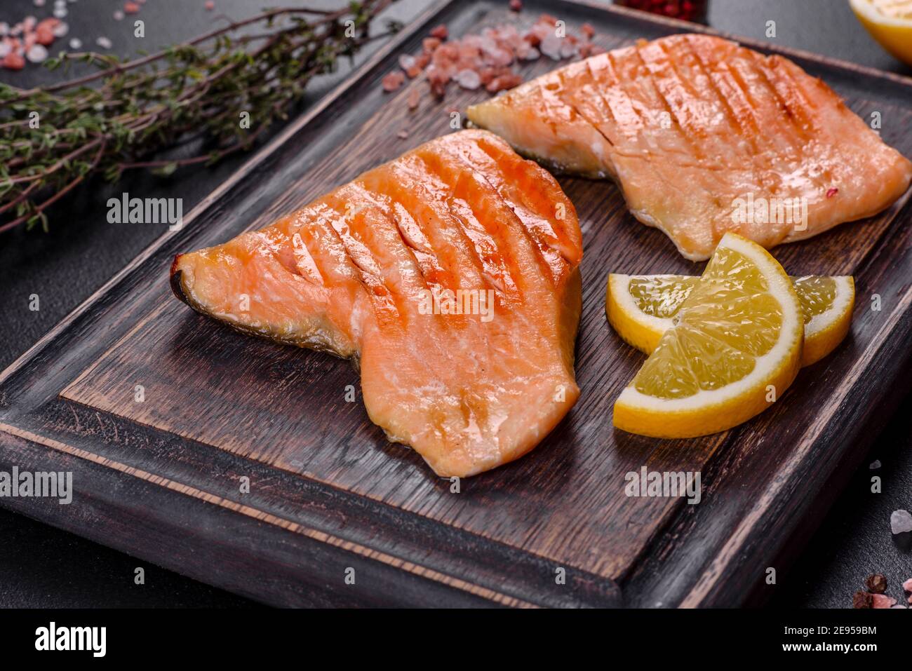 Tasty fresh red fish arctic char baked on a grill. Source of omega ...