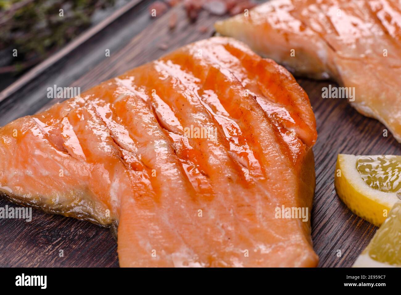 Tasty fresh red fish arctic char baked on a grill. Source of omega ...