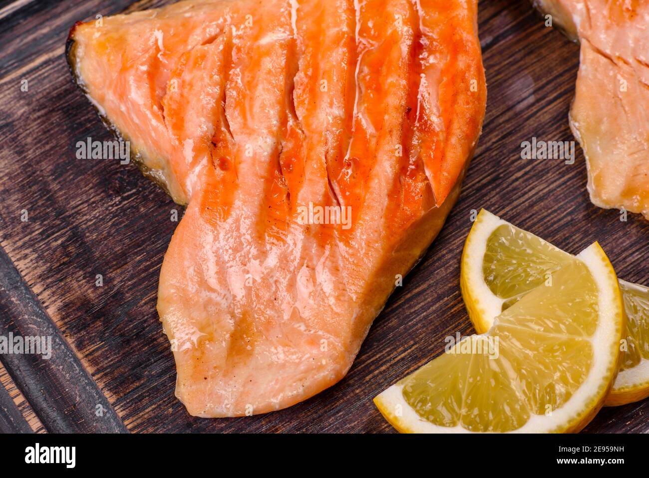 Tasty fresh red fish arctic char baked on a grill. Source of omega ...