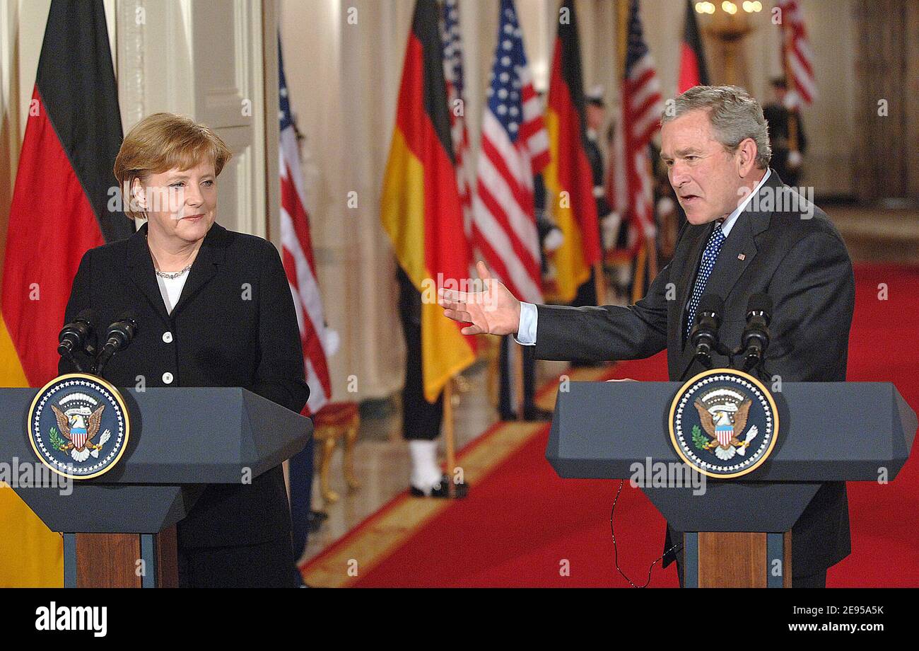 US President George W Bush and German chancellor Angela Merkel give a ...