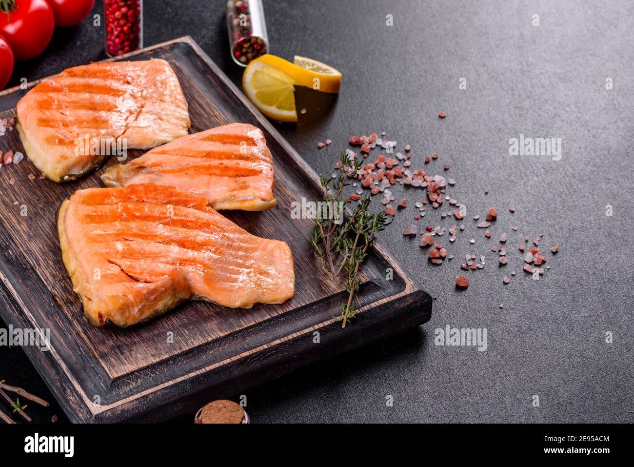 Tasty fresh red fish arctic char baked on a grill. Source of omega ...
