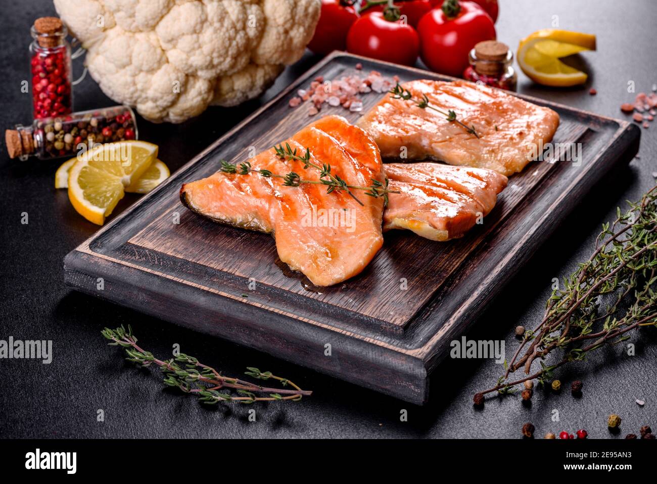 Tasty fresh red fish arctic char baked on a grill. Source of omega ...