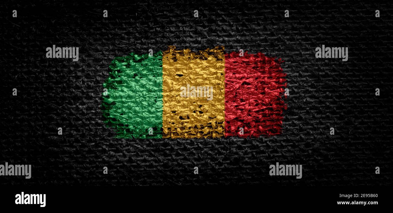 National flag of the Mali on dark fabric Stock Photo - Alamy