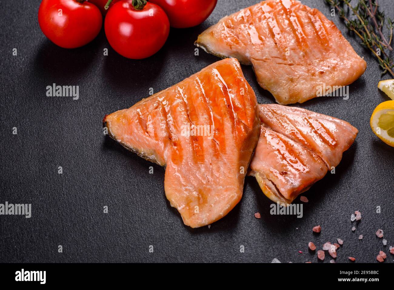 Tasty fresh red fish arctic char baked on a grill. Source of omega ...