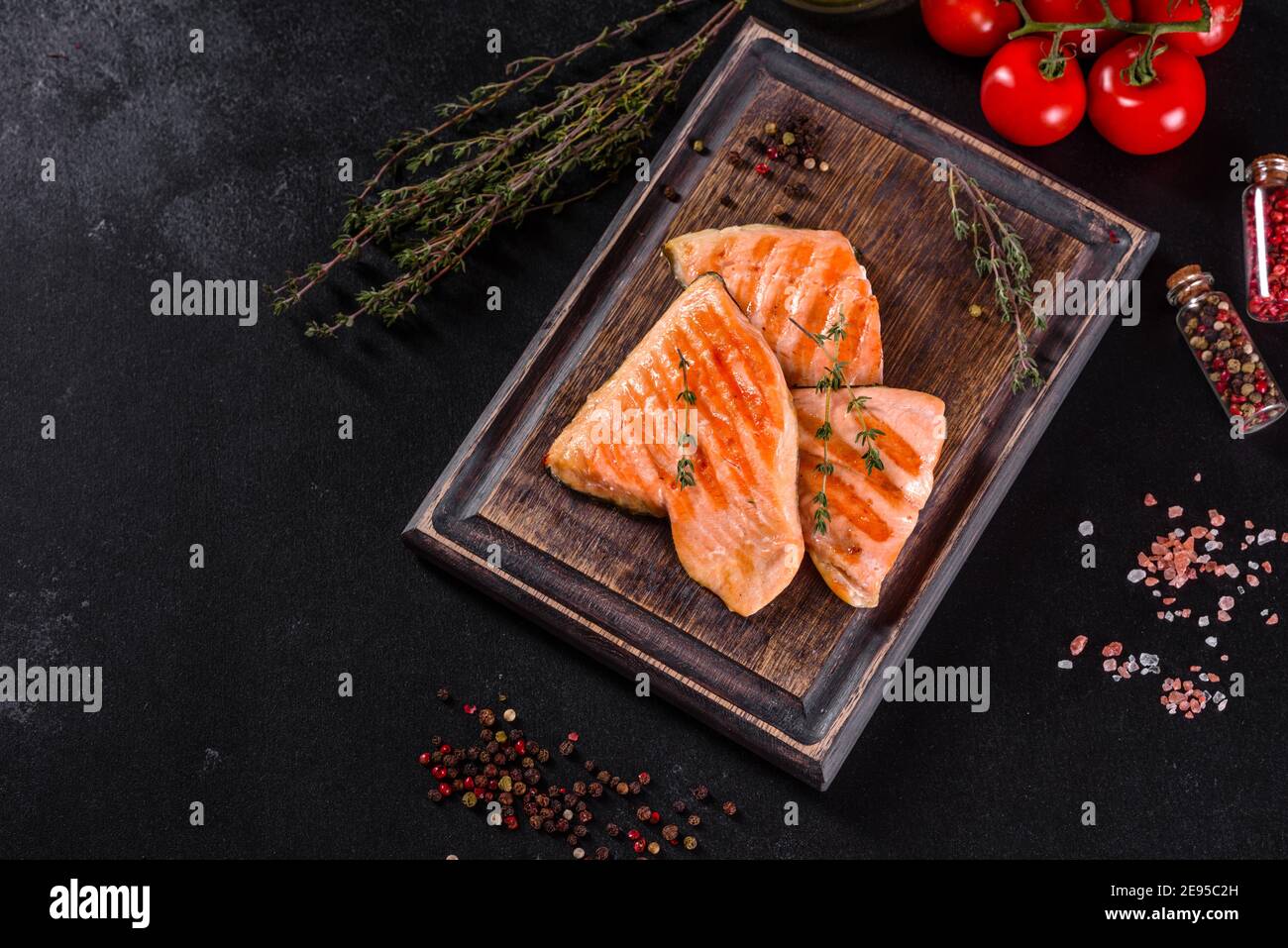 Tasty fresh red fish arctic char baked on a grill. Source of omega ...