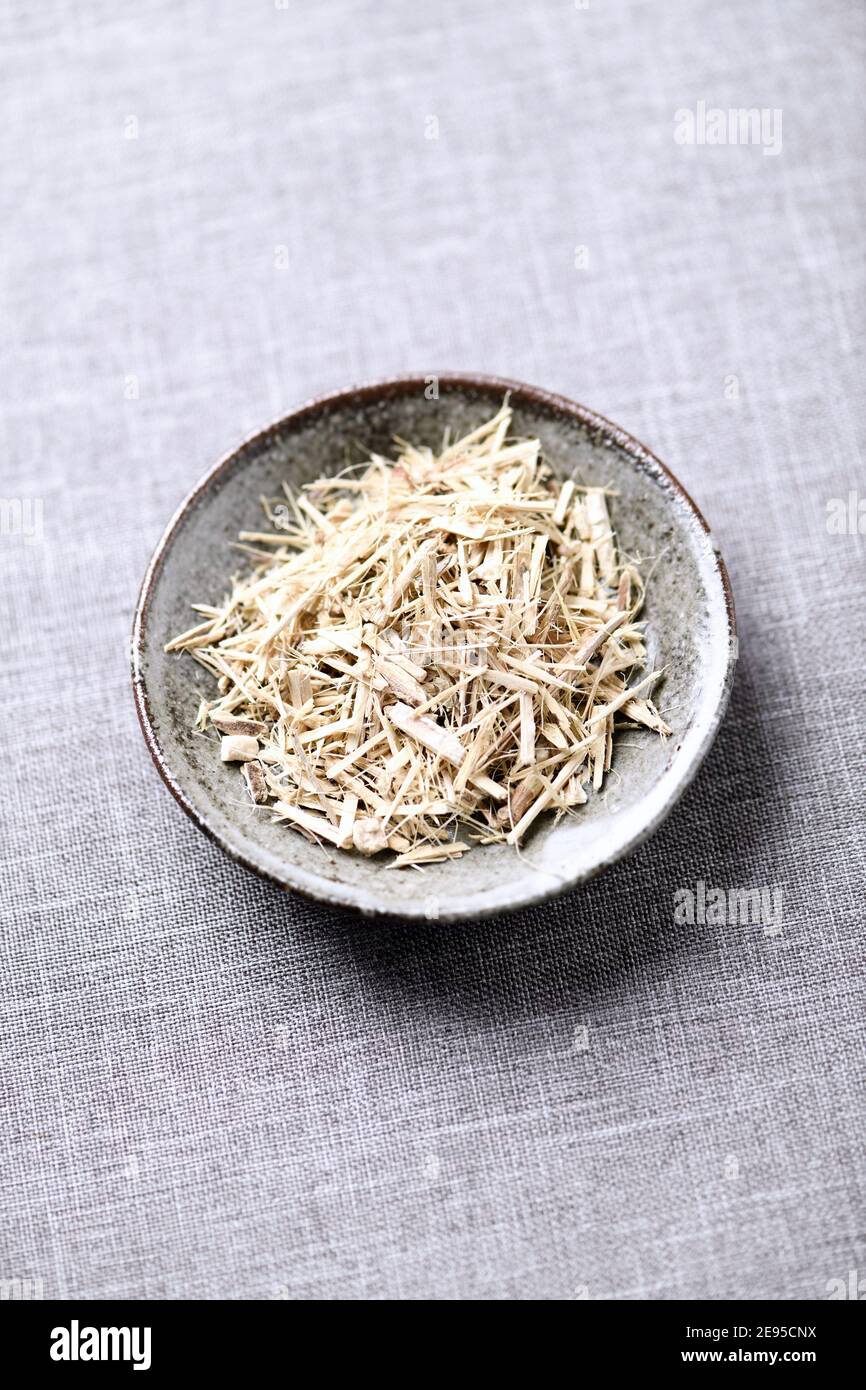 Dry Siberian ginseng (Eleutherococcus senticosus) on linen background ...
