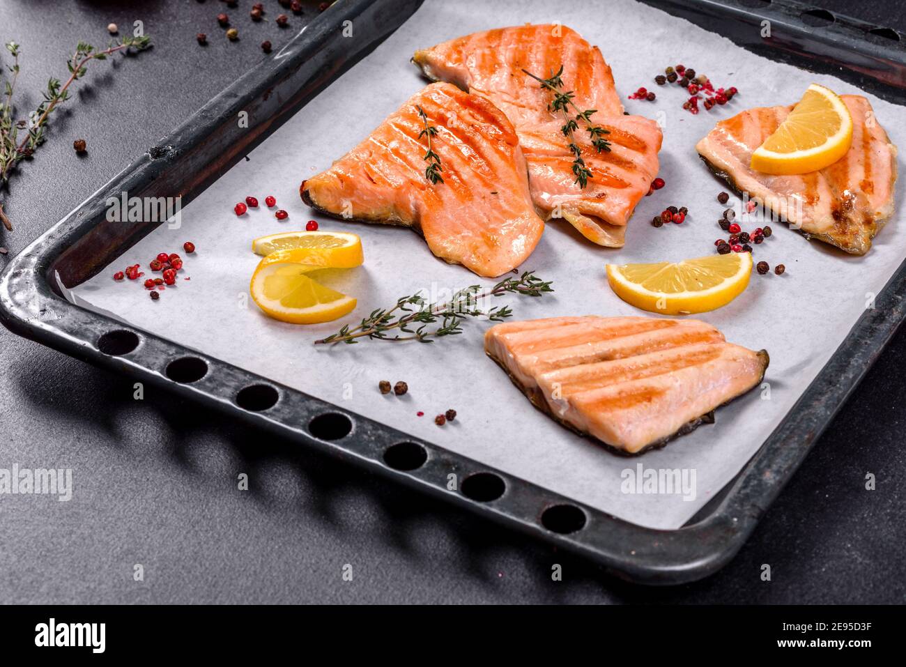 Tasty fresh red fish arctic char baked on a grill. Source of omega ...