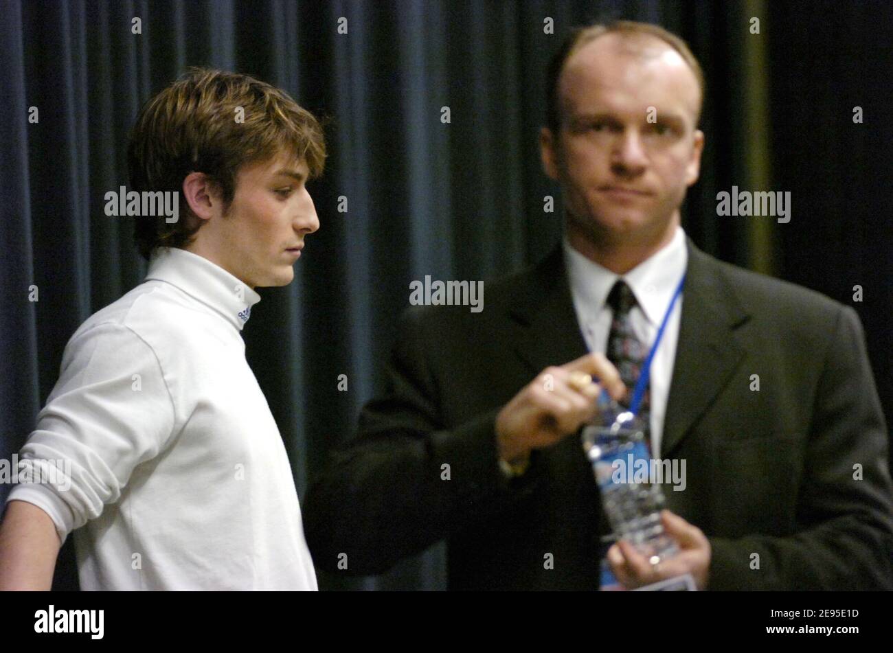 Bronze medalist France's Brian Joubert with his coach before to compete ...