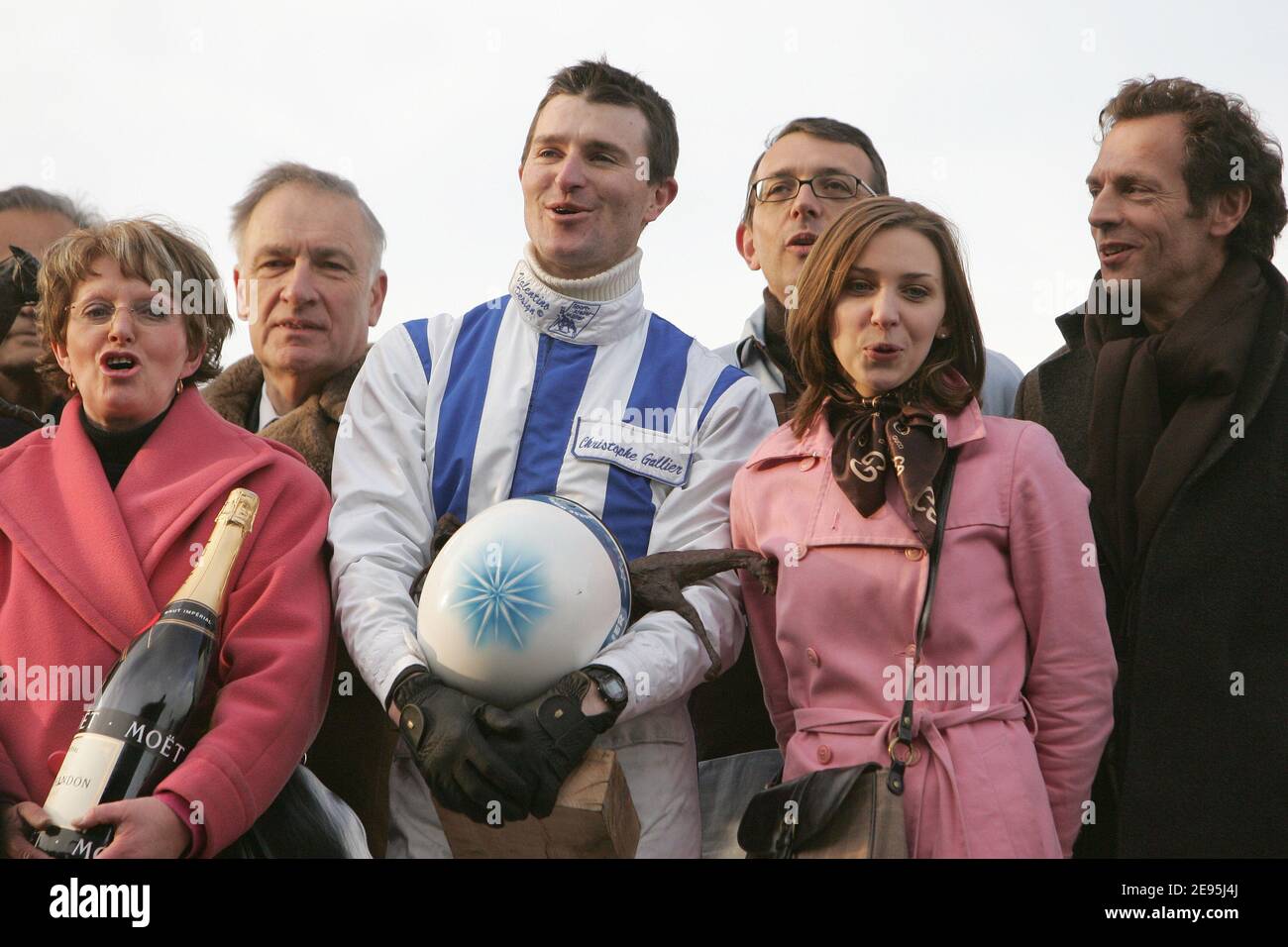 French jockey Christophe Gallier and his wife Marie (D) on the podium ...