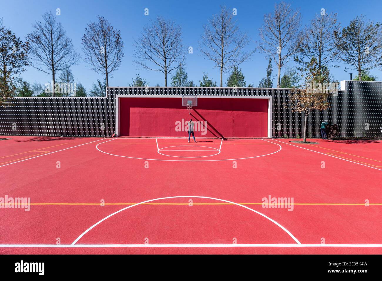 Red basketball court outdoors. Red basketball court outdoors Stock ...