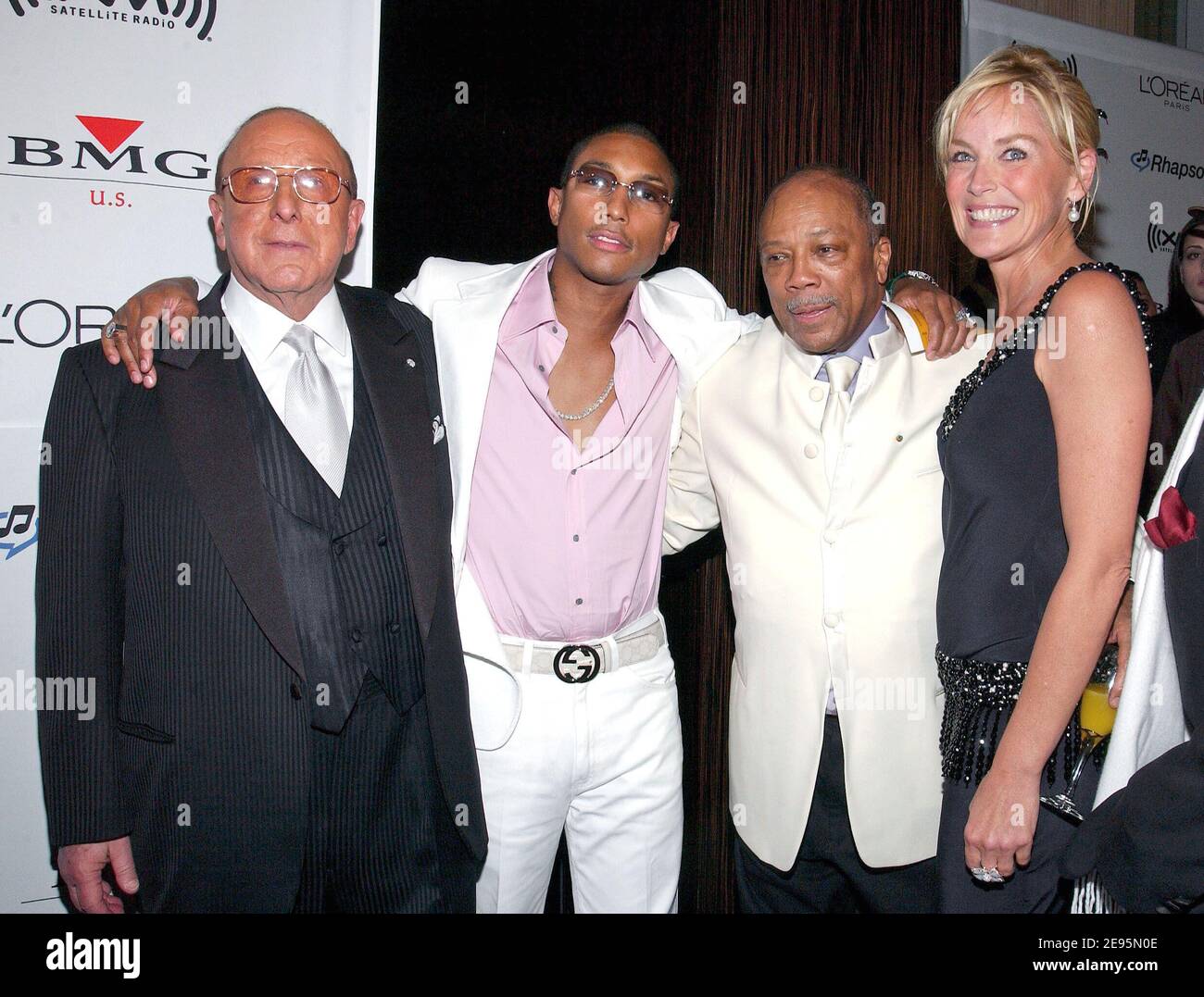 Clive Davis, Pharrell Williams, Quincy Jones and Sharon Stone attend ...