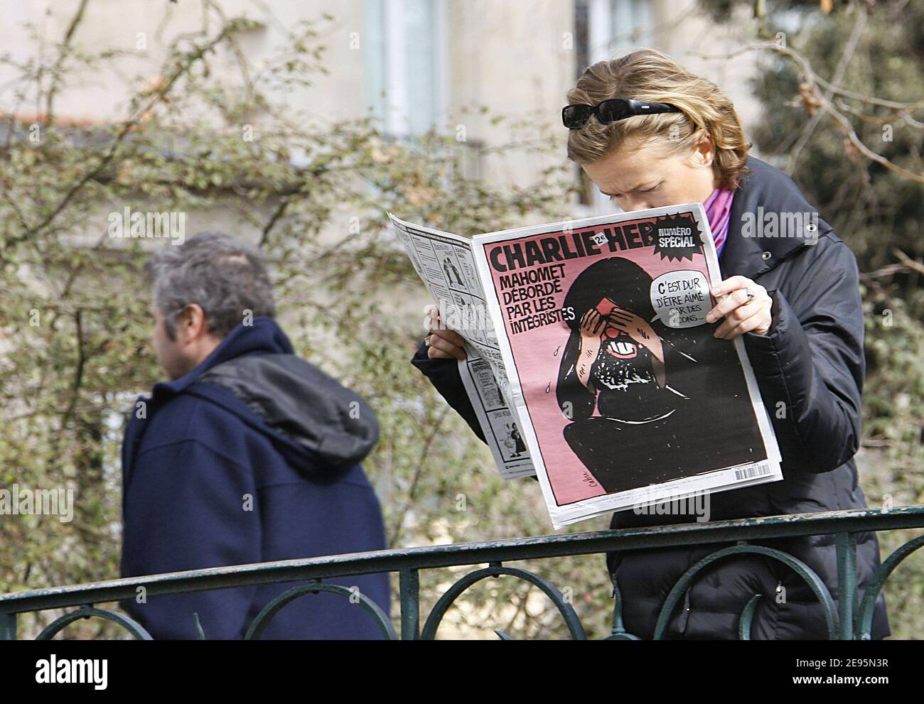 French satiric and humoristic magazine, Charlie Hebdo features all 12 ...