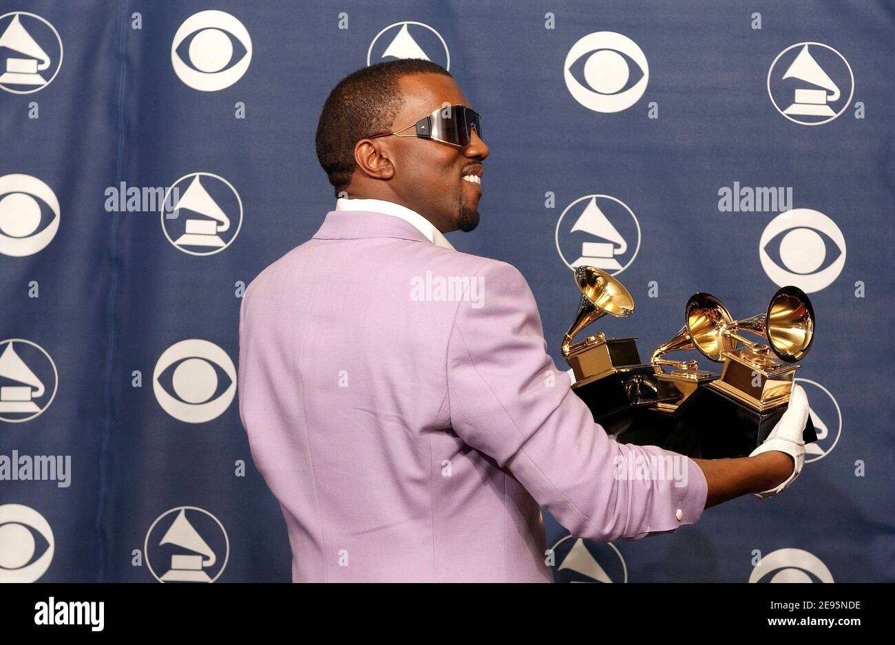 Winner for Best Rap Song, Rap Solo, and Rap Album, Kanye West poses in ...
