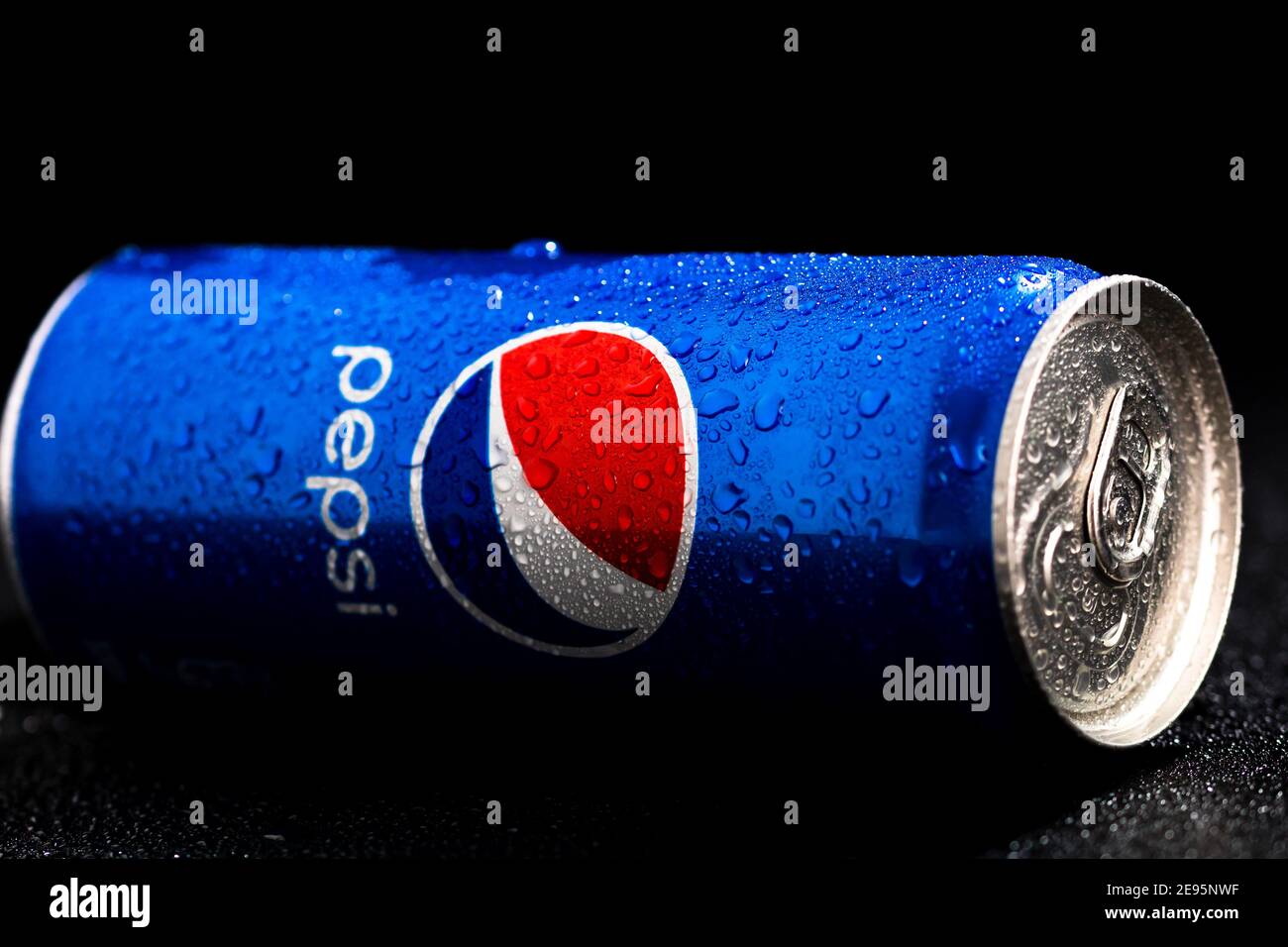 Editorial photo of Pepsi can with water droplets on black background ...
