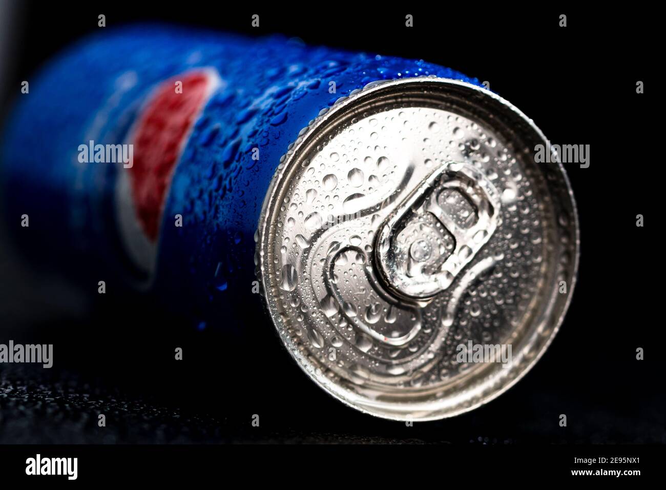 Editorial photo of Pepsi can with water droplets on black background ...