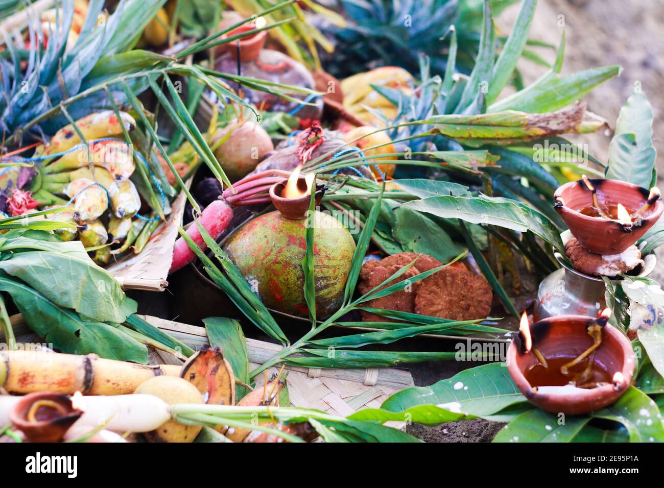 holy offerings of fruits flowers lamps and cloths in river to sun god ...