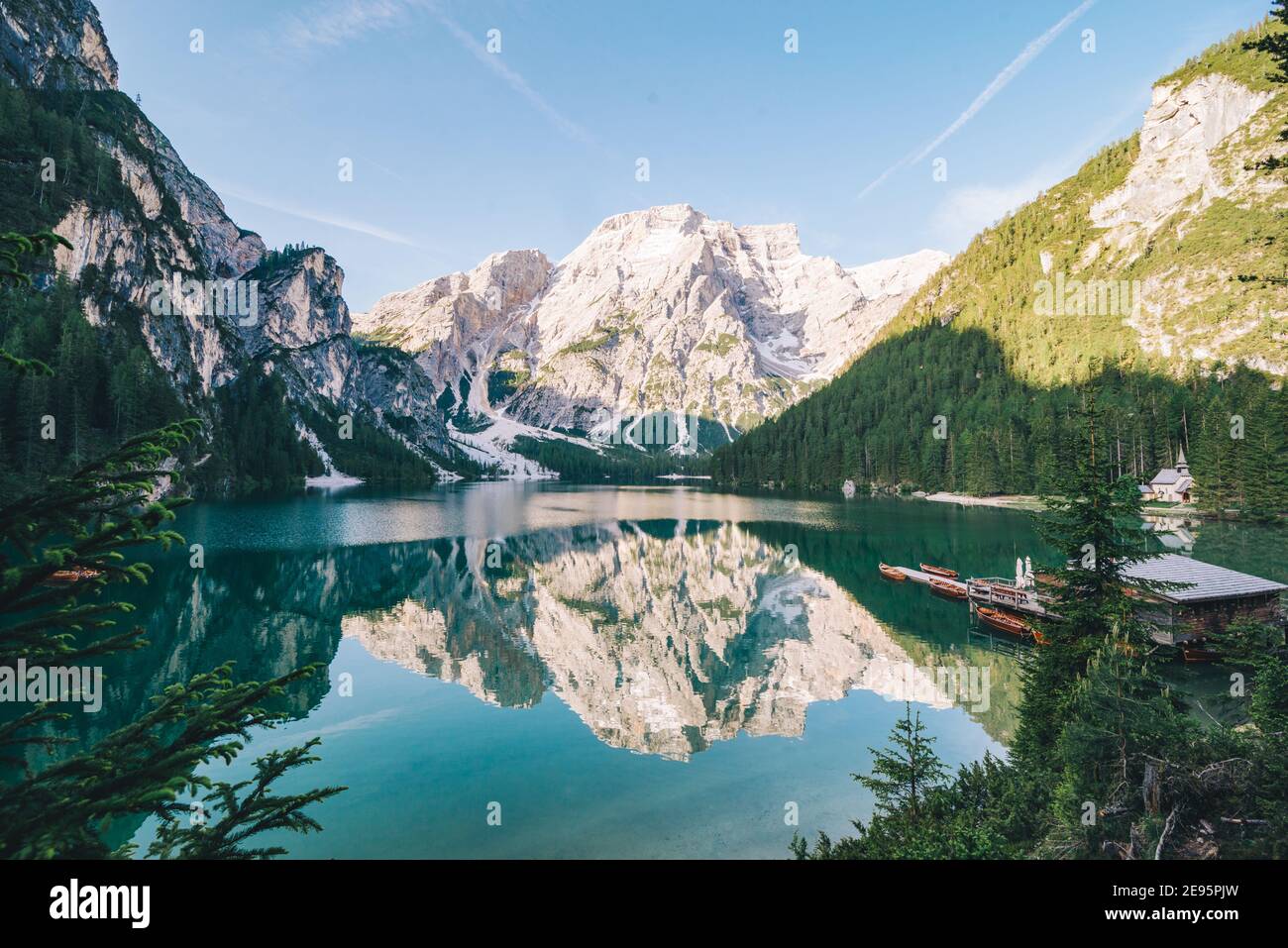 landscape view of alpine lake summer time. reflection in water surface ...
