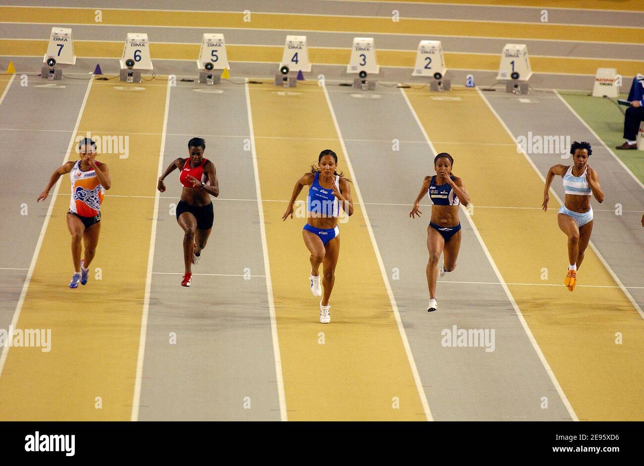 France's Christine Arron (C) competes during 60m sprint at the French ...