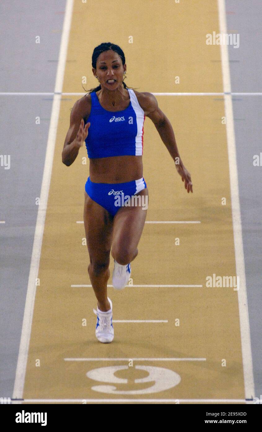 France's Christine Arron competes during 60m sprint at the French track ...