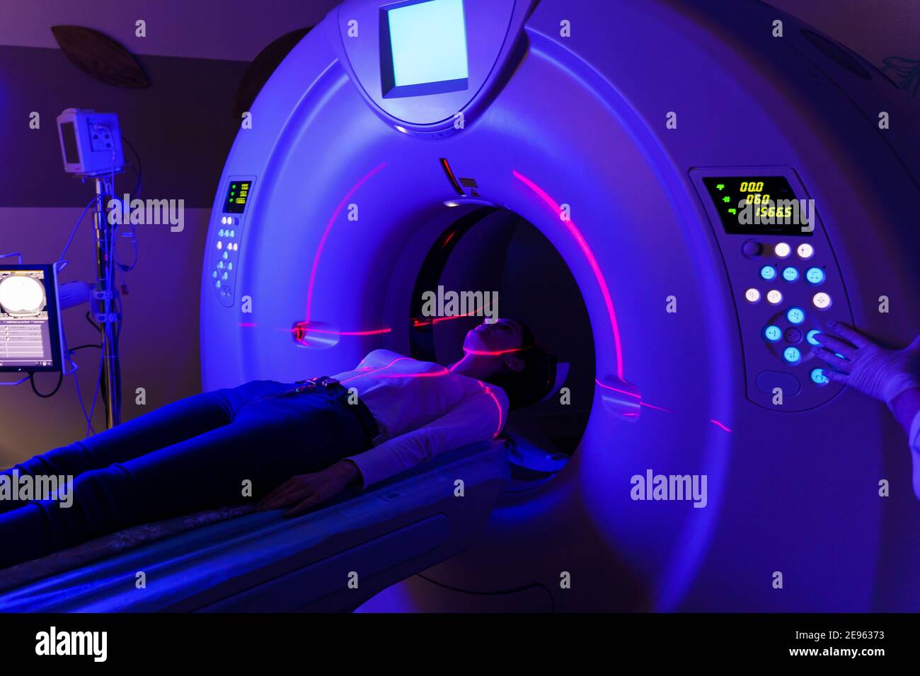 CT of joints in a clinic with blue color and red scanning laser ...