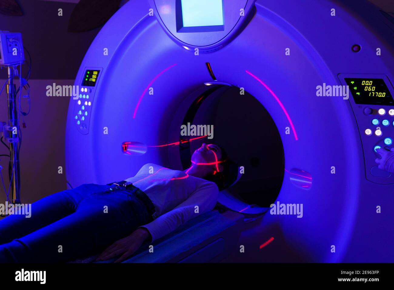 Computer diagnosis of the pelvis of a girl in a clinic with blue and ...