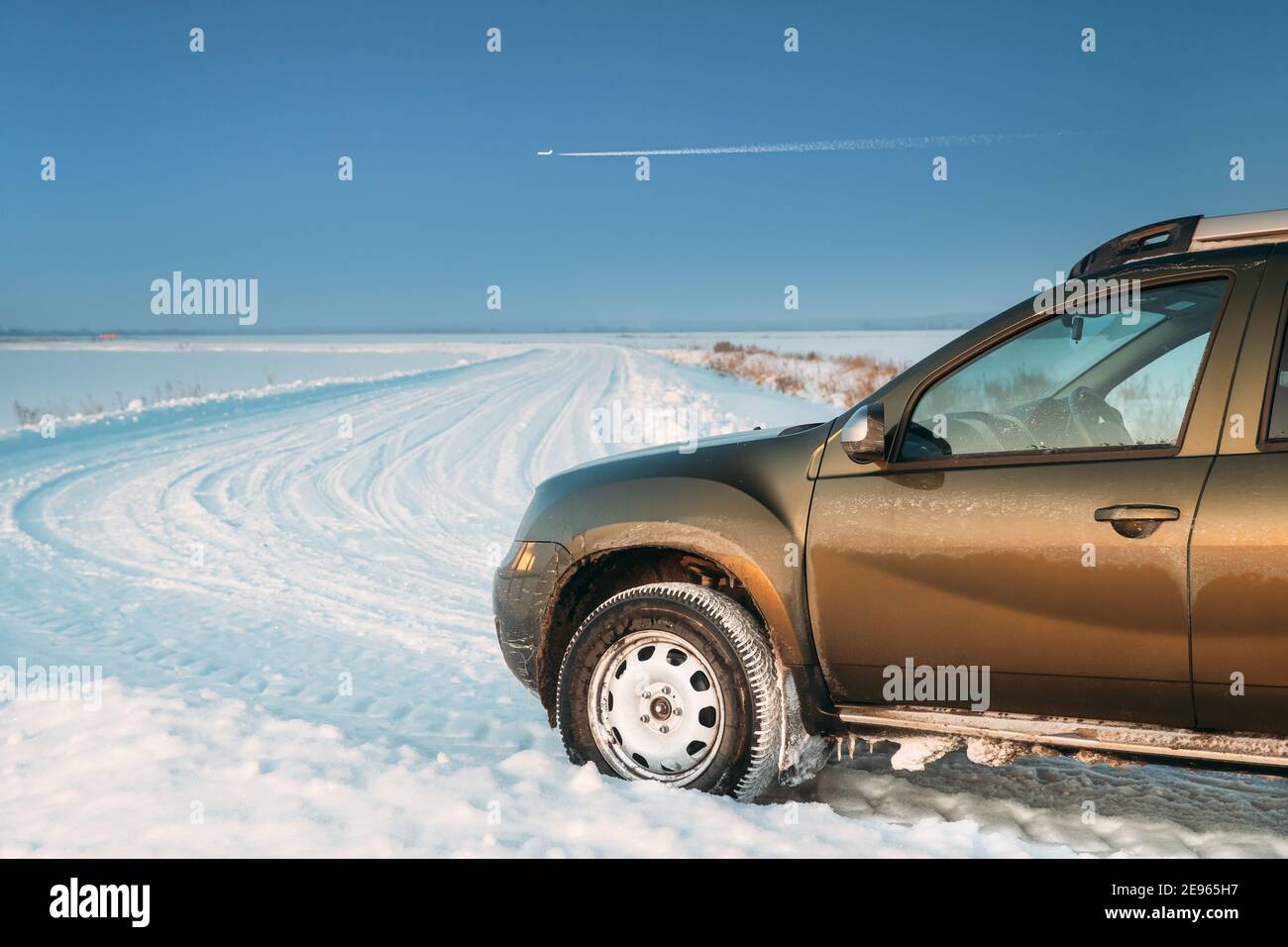 Frozen And Grungy SUV Car Parked On Winter Snowy Field Countryside ...