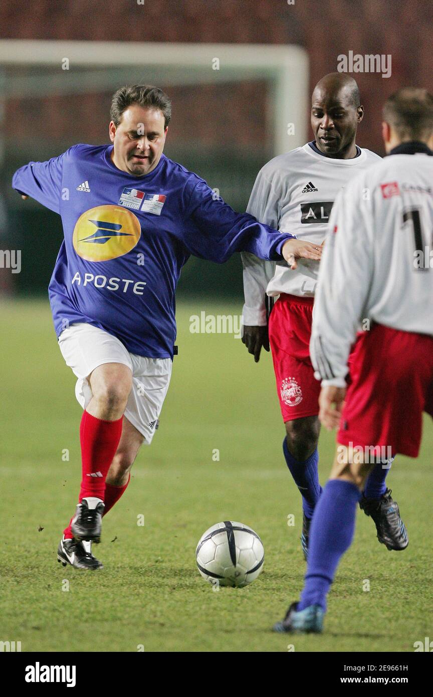 Minister for Health and Solidarity, Xavier Bertrand, playing during a ...
