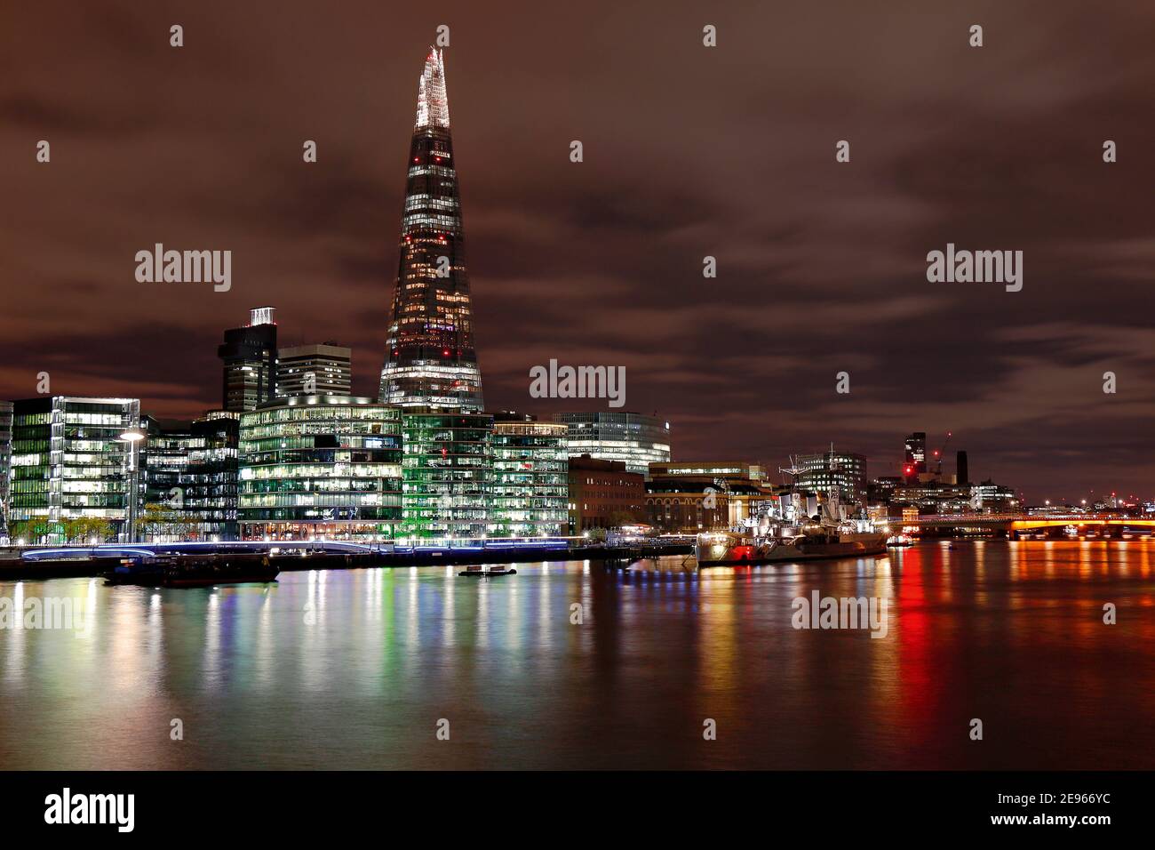 The shard and london skyline reflecting on thames Stock Photo - Alamy