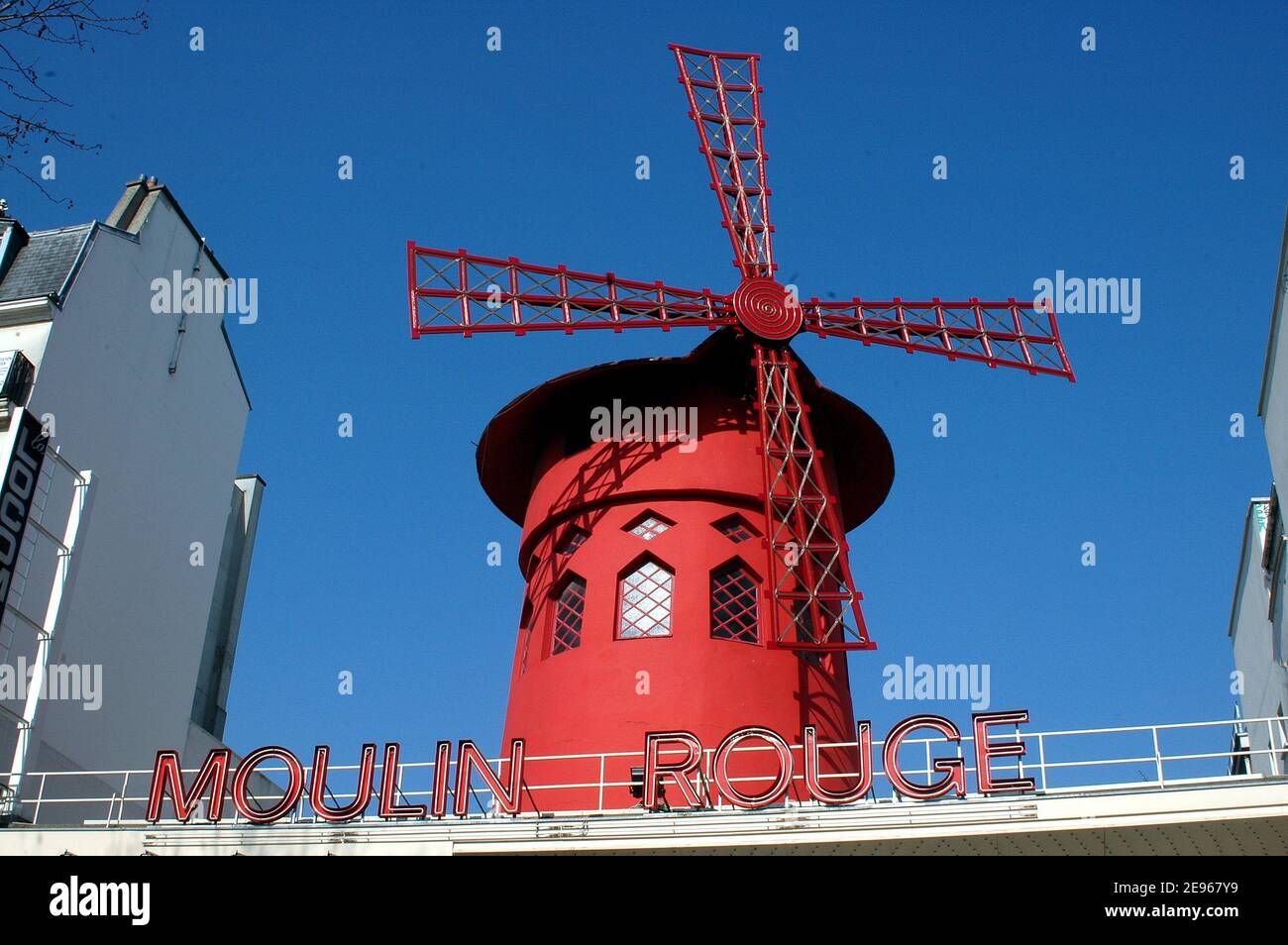 Exterior views of world famous cabaret Moulin Rouge in Pigalle district ...