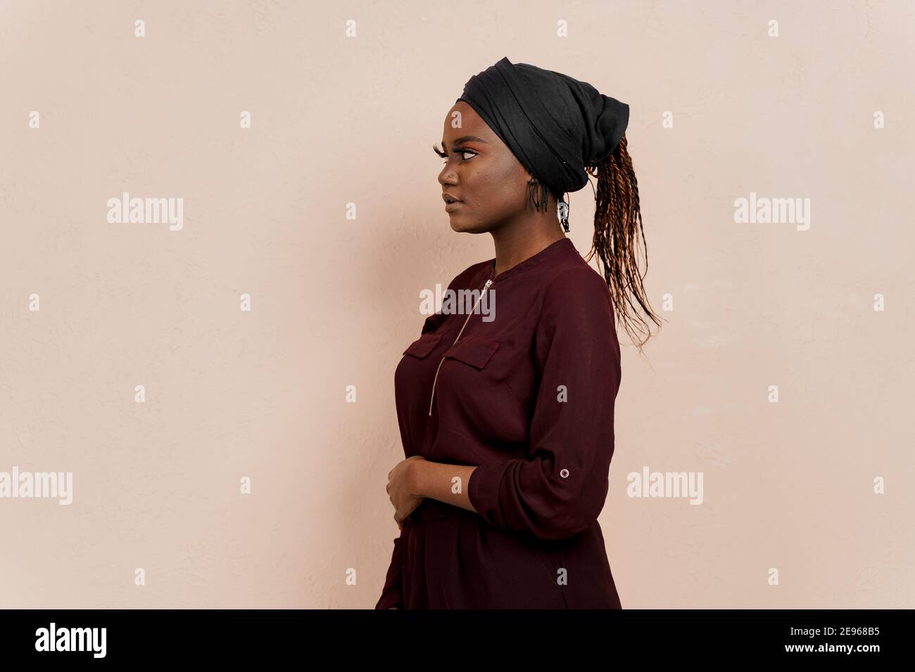 Muslim black girl looks left side. African woman weared in national ...