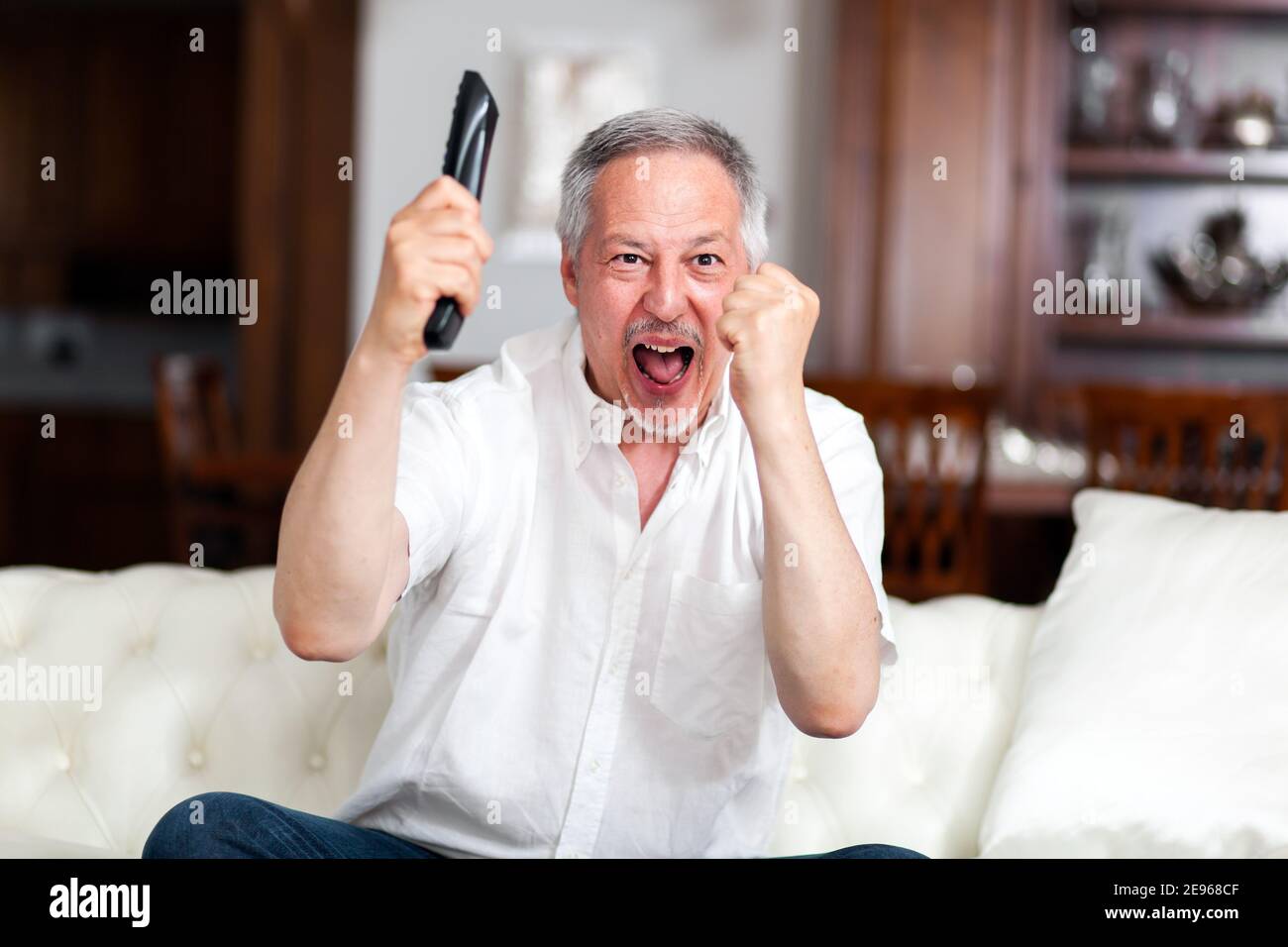 Ecstatic man hi-res stock photography and images - Alamy