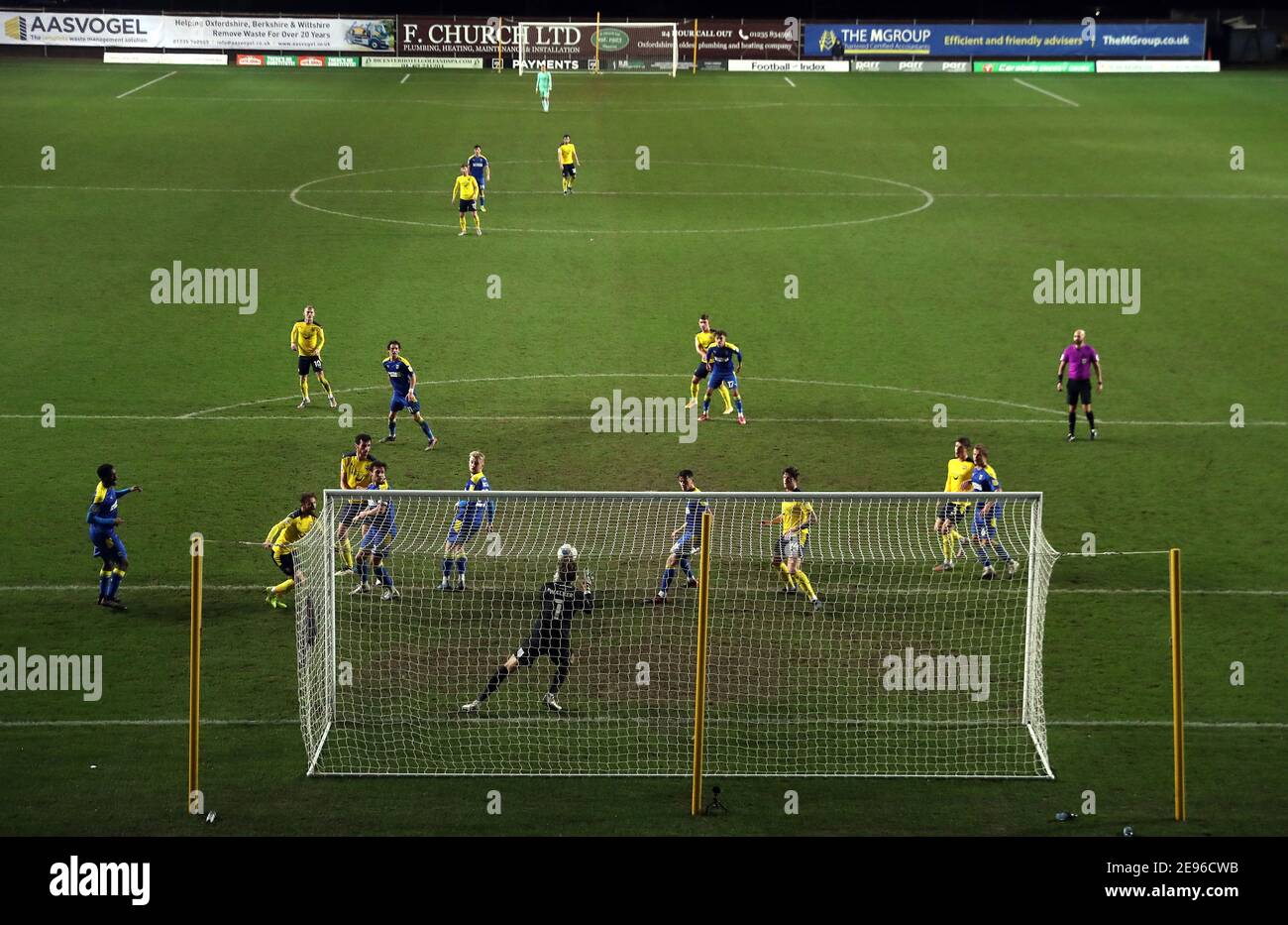 AFC Wimbledon goalkeeper Sam Walker makes a save from Oxford United's ...