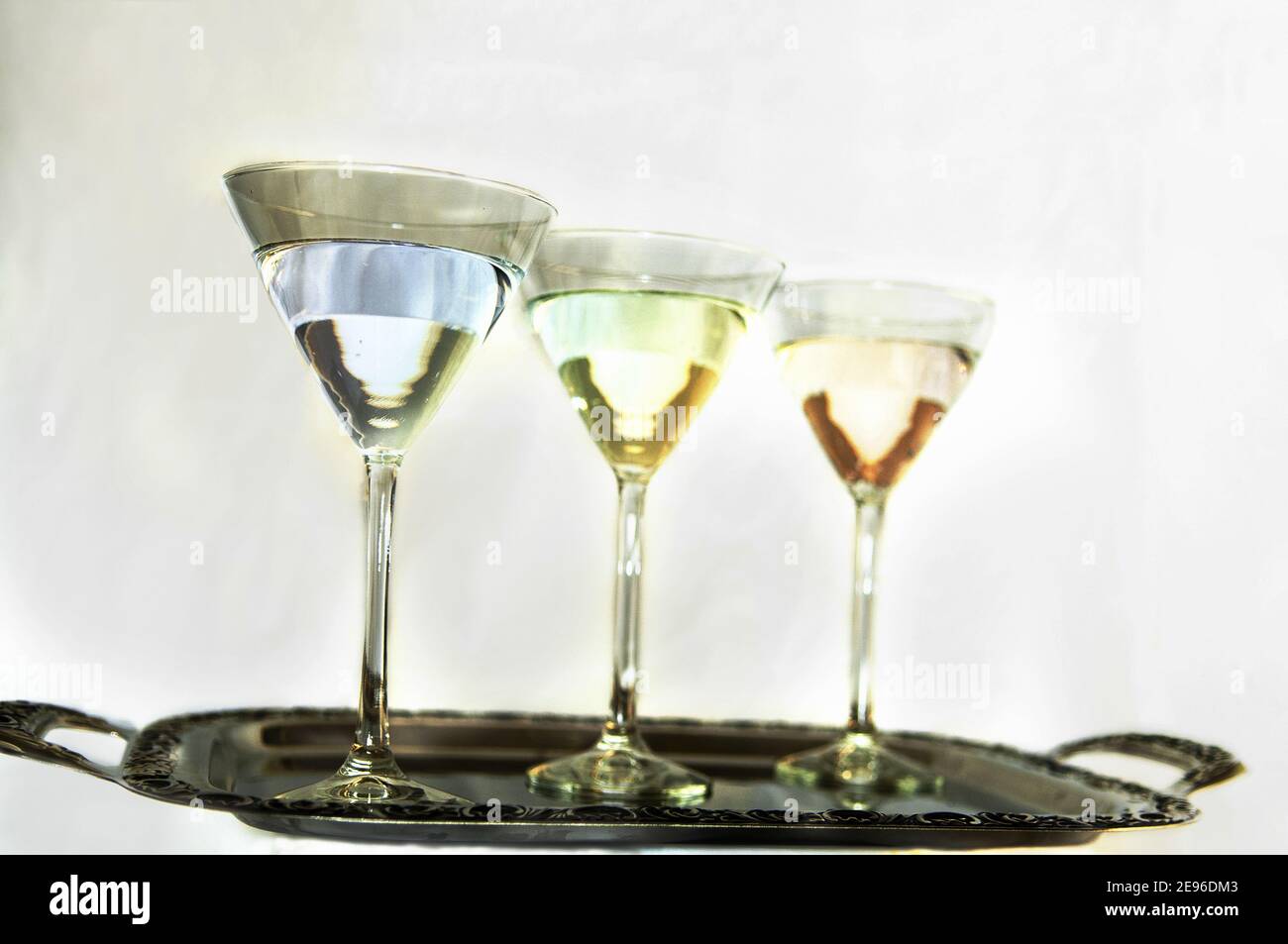 Three martini glasses on a tray hi-res stock photography and images - Alamy