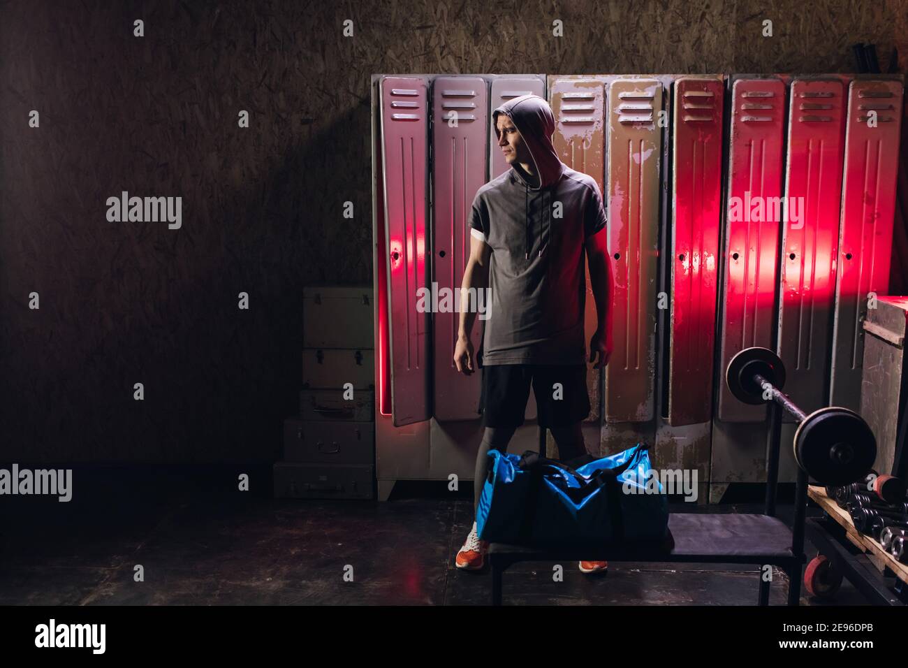 Man get ready for boxing training in the locker room Stock Photo - Alamy
