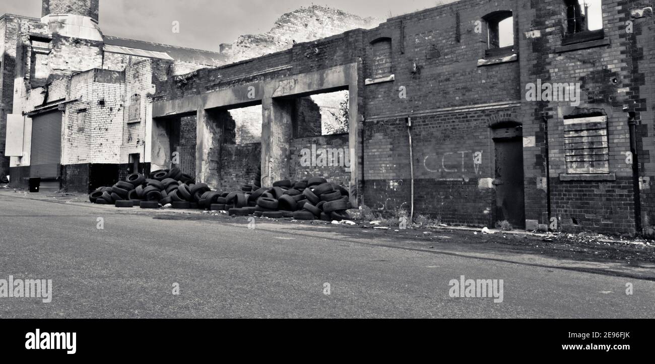 Dilapidated warehouses in an old industrial area in the docklands. Old ...