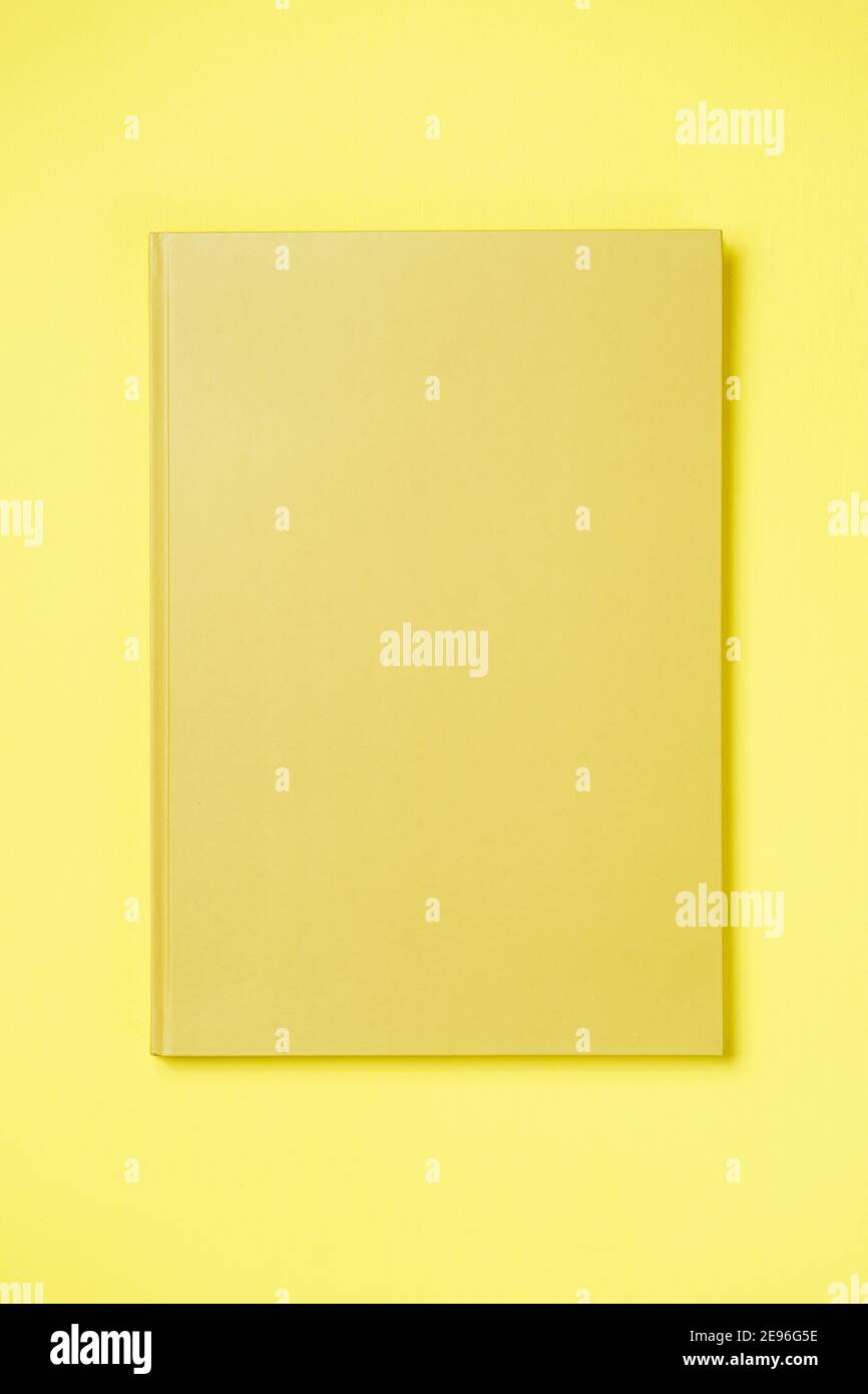 Leather notebook cover on a paper yellow background, notepad mock up ...
