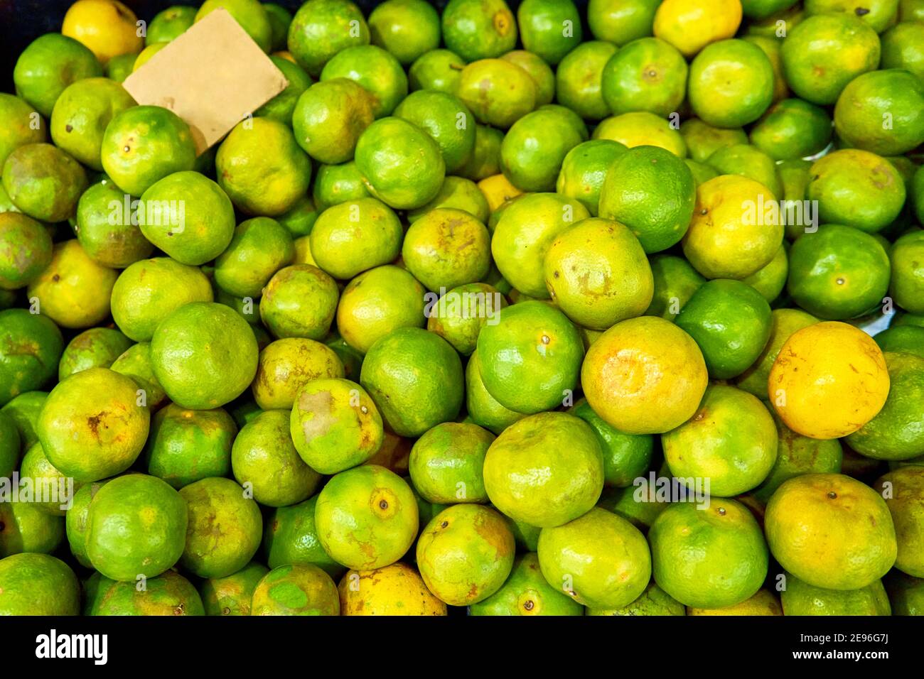 Lime counter at a grocery store in Malaysia Stock Photo - Alamy
