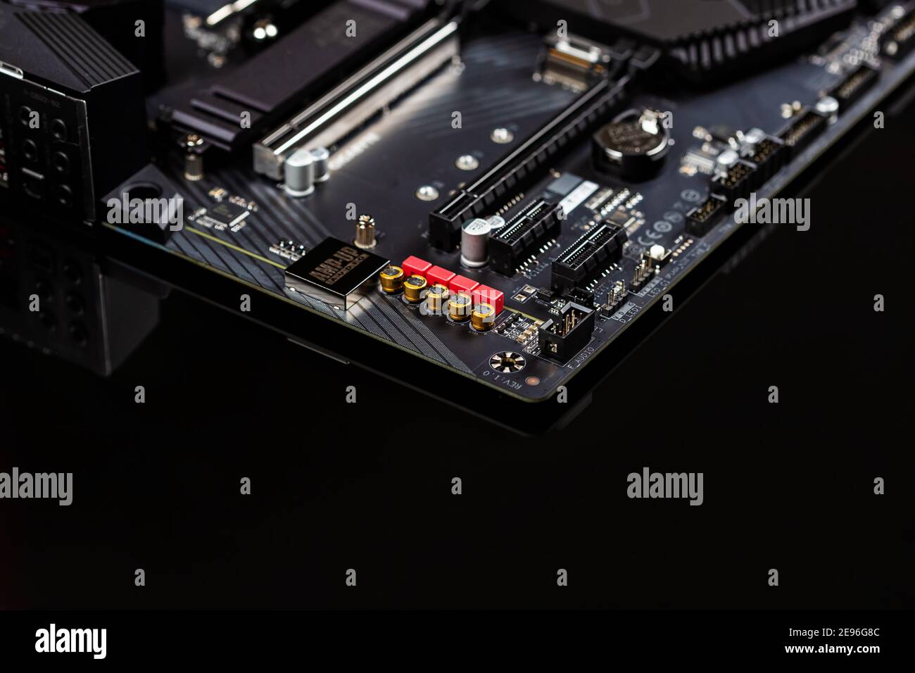 The motherboard on a table close-up, inside of a desktop computer ...