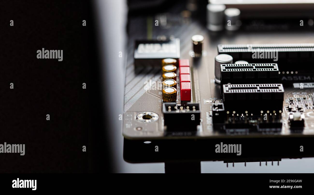 The motherboard on a table close-up, inside of a desktop computer ...